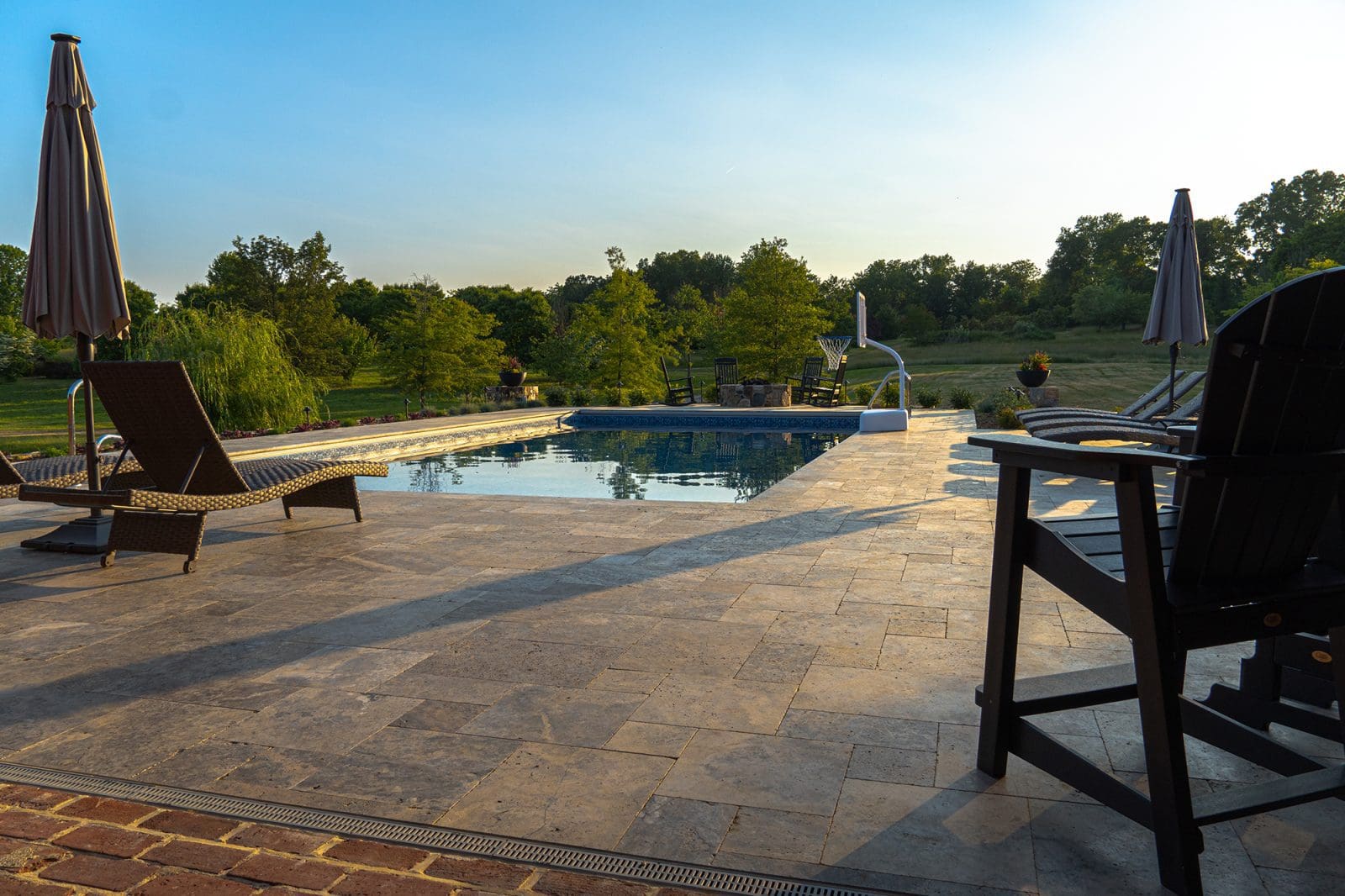 Project #026 – Travertine Pool Deck, Retaining Wall & Fire Pit