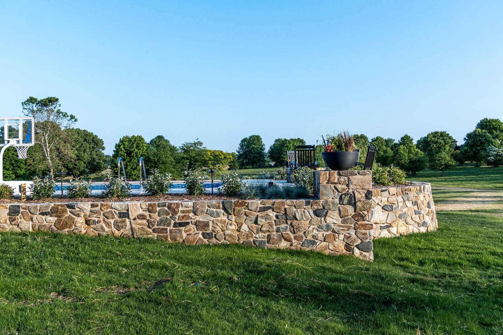 Project #026 – Travertine Pool Deck, Retaining Wall & Fire Pit